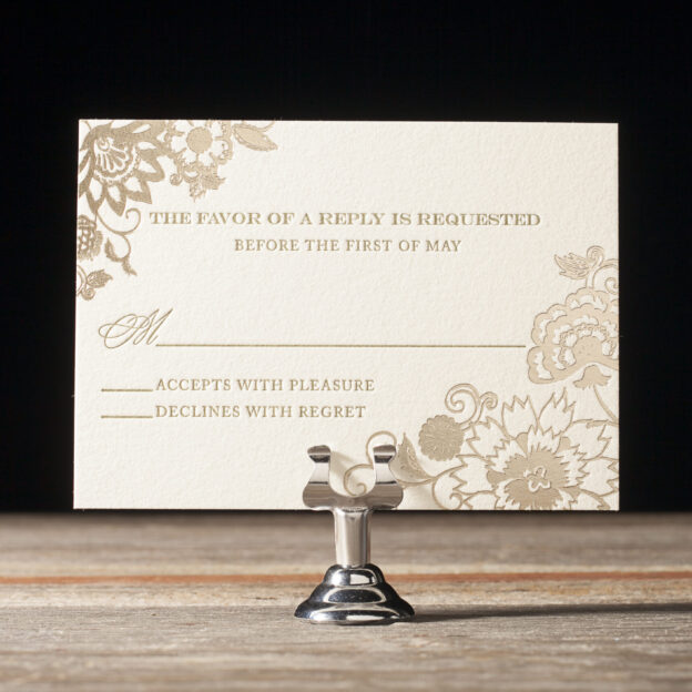 Coriander letterpress + foil stamped floral wedding invitations