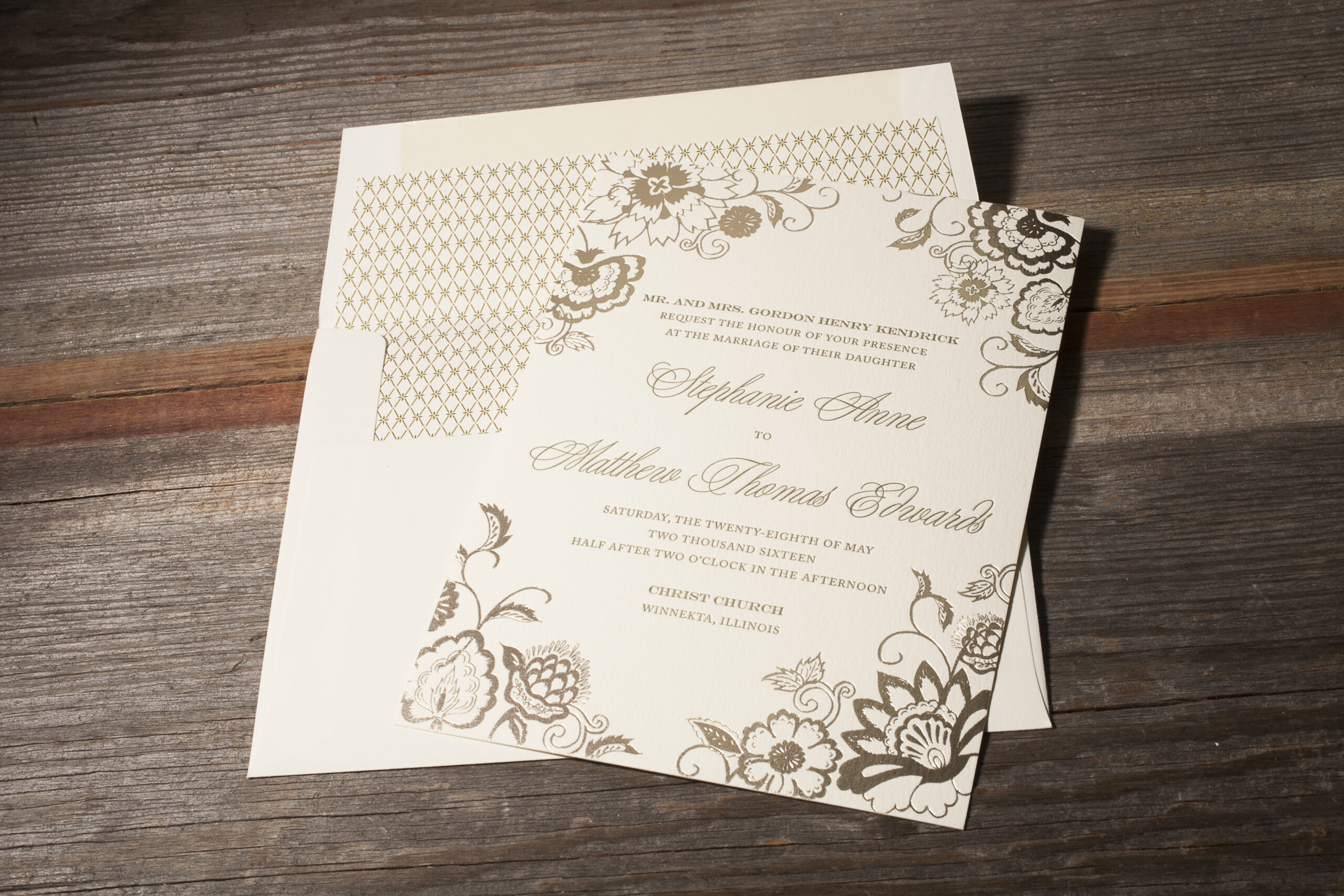 Coriander letterpress + foil stamped floral wedding invitations