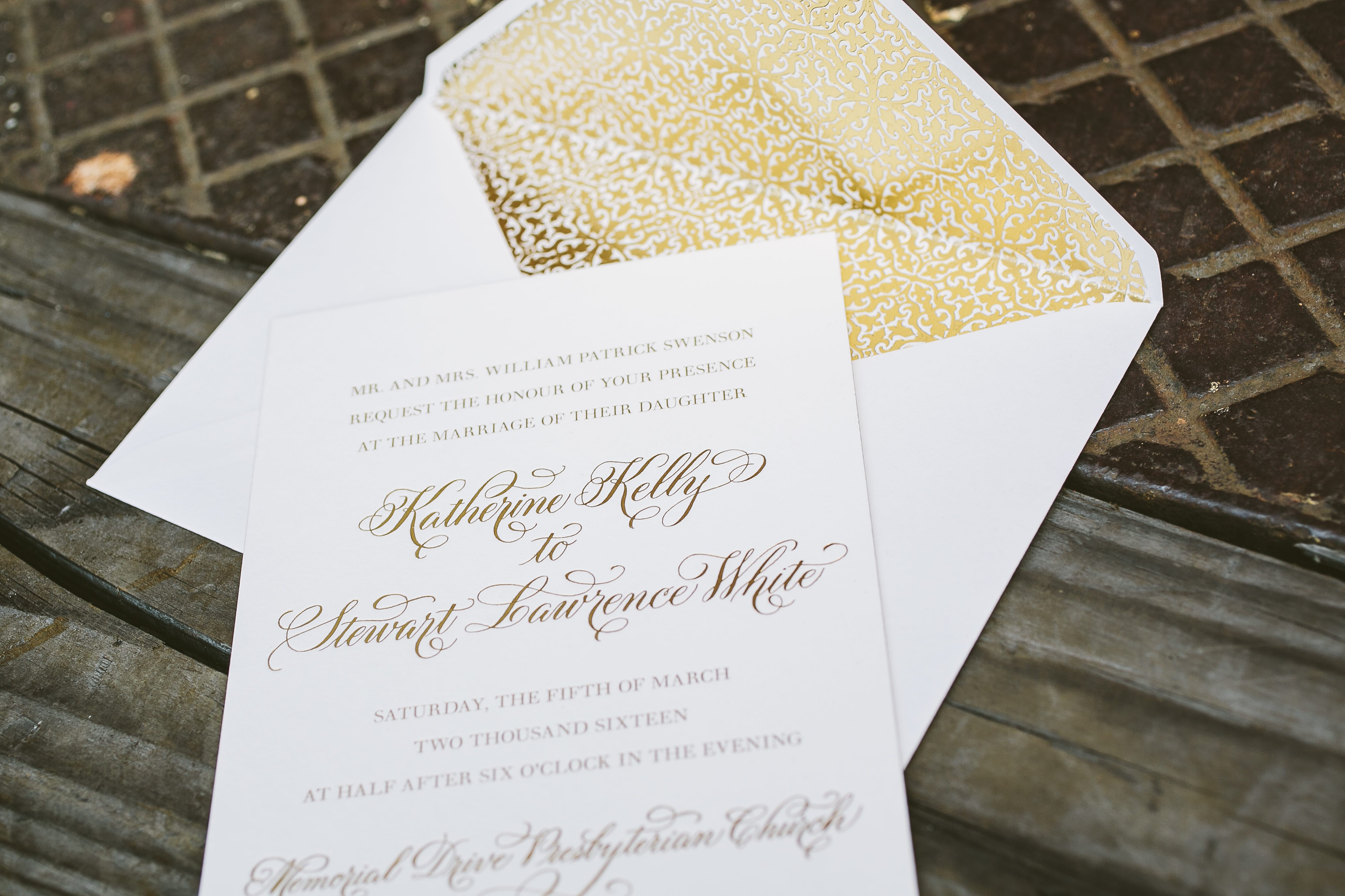 Elegant gold calligraphy wedding invitations with foil liners