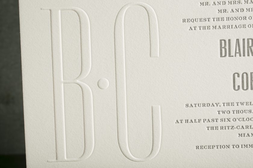 Custom letterpress + blind embossed wedding invitations